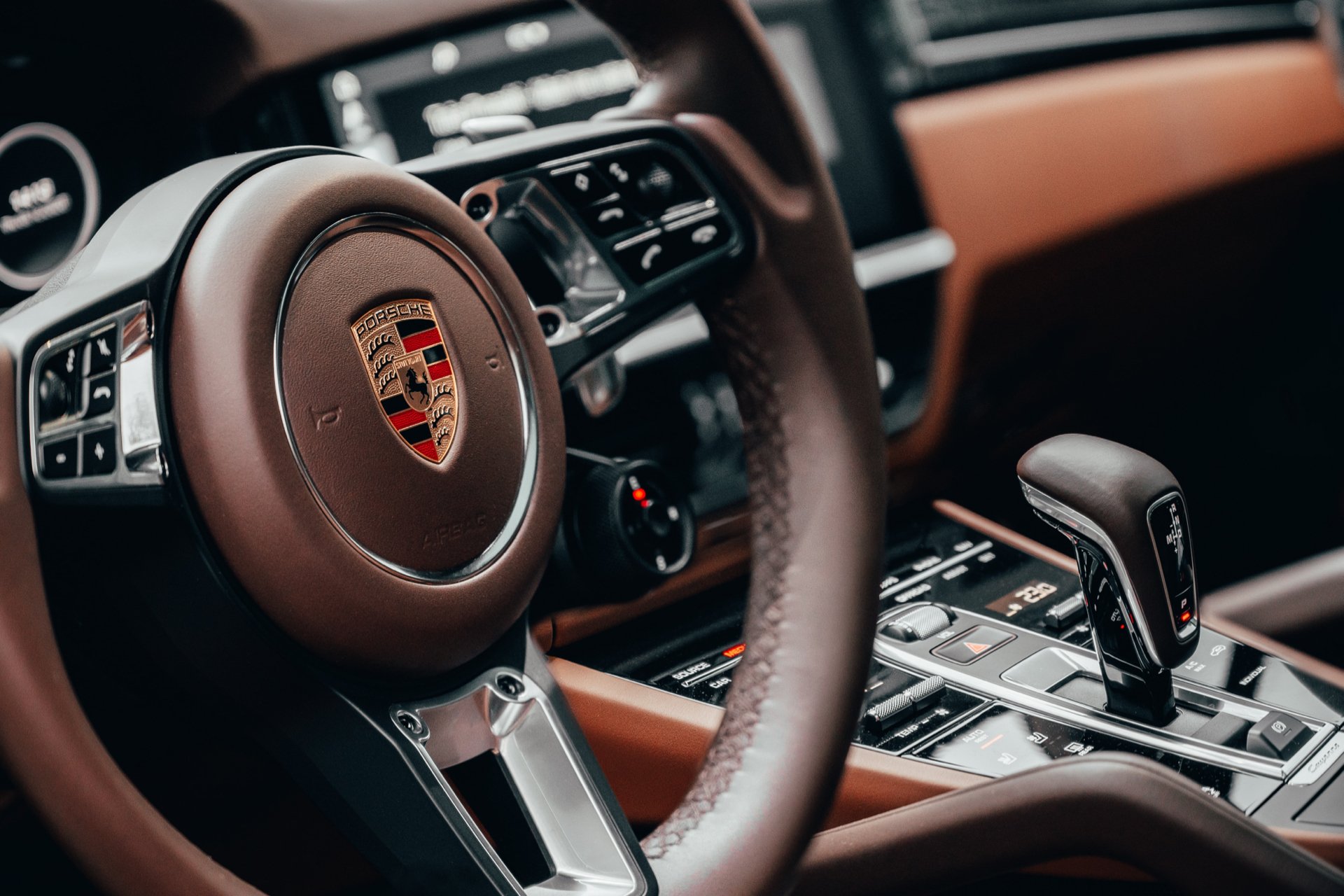 Porsche Logo Evolution: Symbolism of Luxury & Power